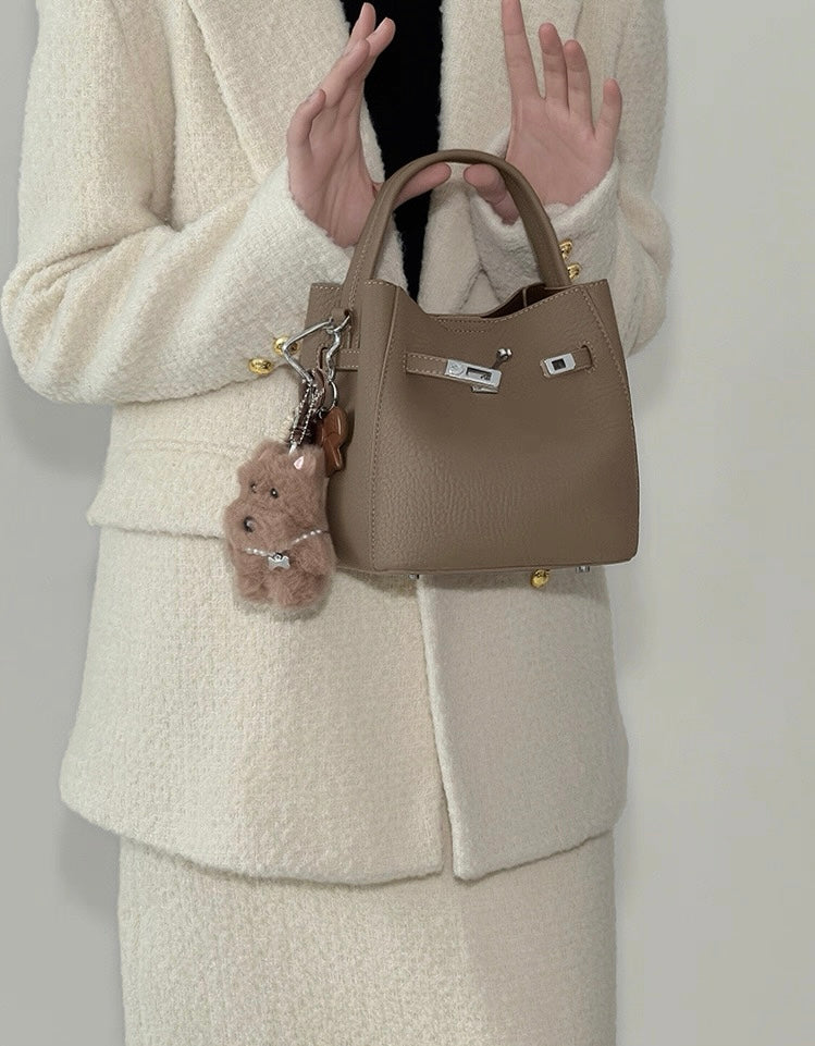 牛皮凯丽水桶包 Keilly Cowhide Structured Pebbled Top Handle Bag – PINGOFASHION